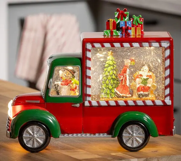 EVERGREEN 9'l Led Santa & Mrs. Claus In Truck W Ater Lantern - One-color