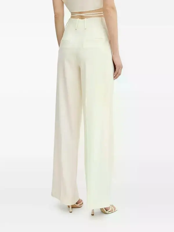 SIMONA CORSELLINI Front-pleated Trousers