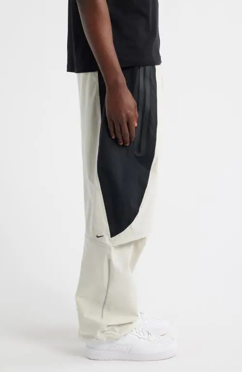 Nike Tech Dri-fit Woven Oversize Stretch Nylon Pants - Light Bone/black