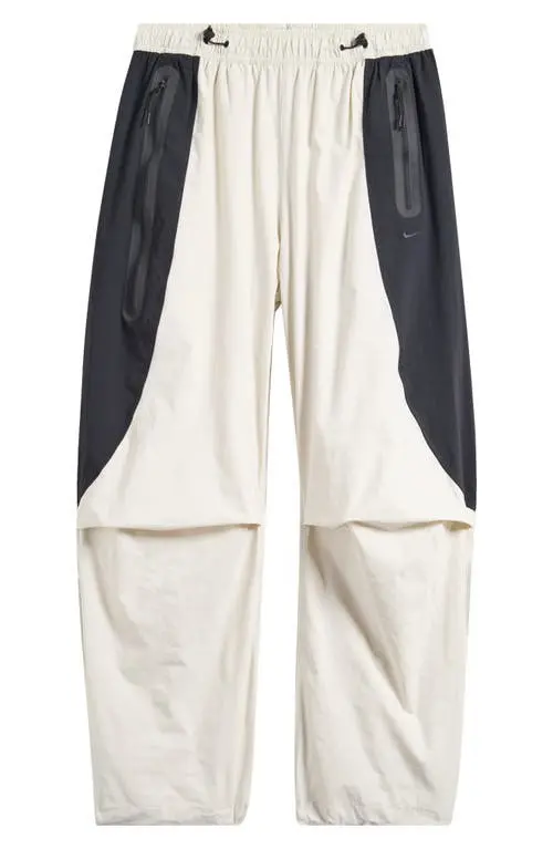 Nike Tech Dri-fit Woven Oversize Stretch Nylon Pants - Light Bone/black