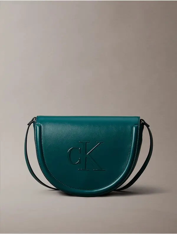 Calvin Klein Embossed Monogram Saddle Bag - Maya Blue