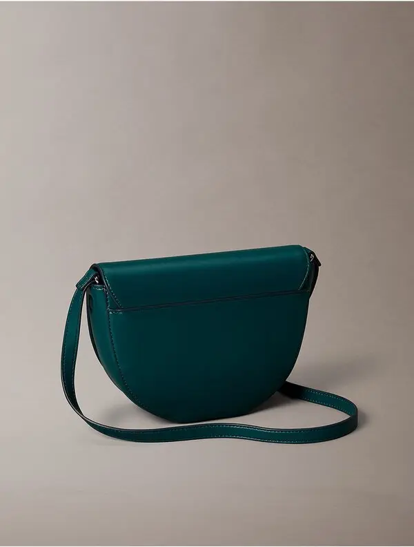 Calvin Klein Embossed Monogram Saddle Bag - Maya Blue