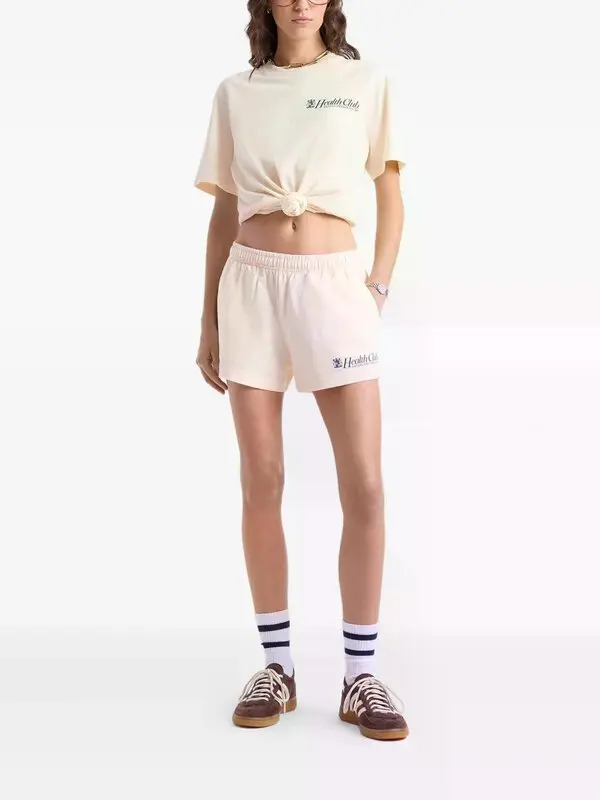 SPORTY & RICH Lion Health Disco Shorts