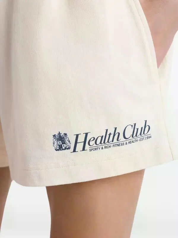 SPORTY & RICH Lion Health Disco Shorts