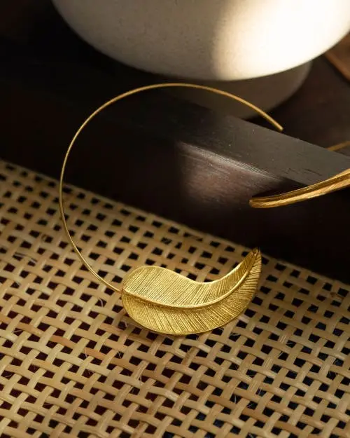 OTTOMAN HANDS Gold Feather Pull Through Hoop Earrings - Brass