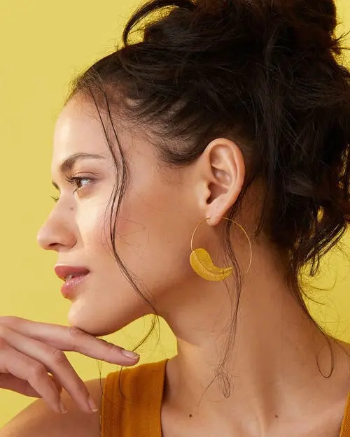 OTTOMAN HANDS Gold Feather Pull Through Hoop Earrings - Brass
