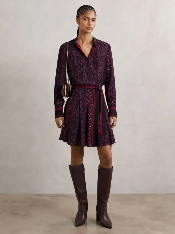 burgundy snake print dress Women's Snake In The Grass Faux Leather Snake Print Romper In Burgundy main image 1