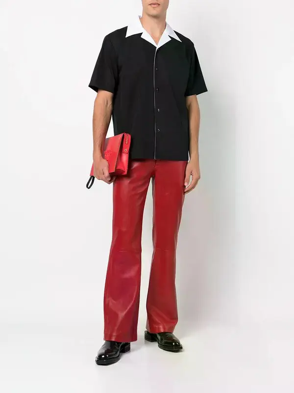 ERNEST W. BAKER Flare-cut Coated-cotton Trousers