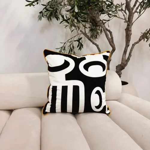 VILLA ABURI Duafe Throw Pillow