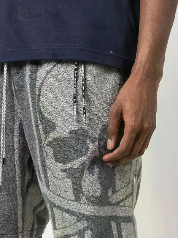 MASTERMIND WORLD Striped Skull-print Track Shorts