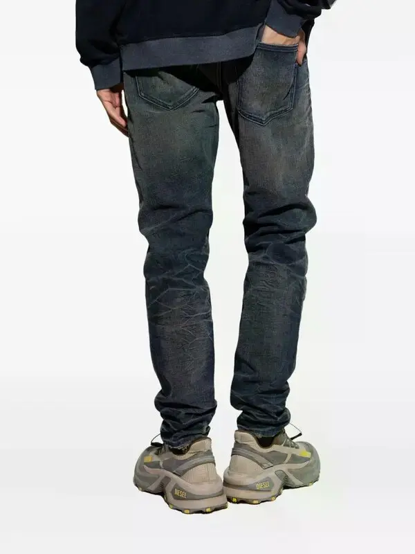 DIESEL® Faded Distressed Jeans