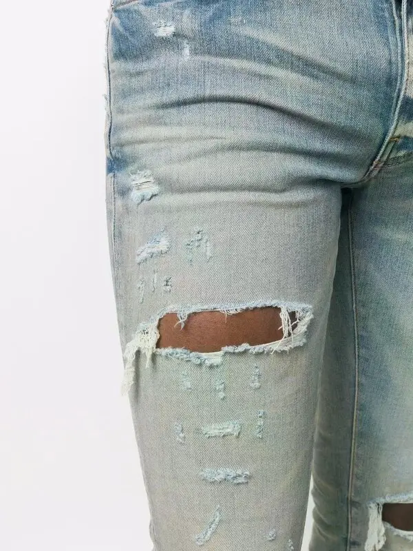 Amiri Distressed Skinny Jeans