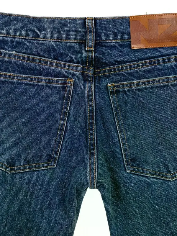 Natasha Zinko Flared Distressed Jeans
