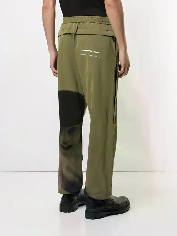 Undercover A Clockwork Orange Print Track Pants - Green