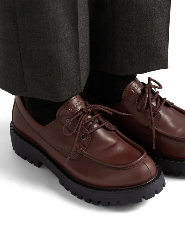 Prada Laced Leather Loafers