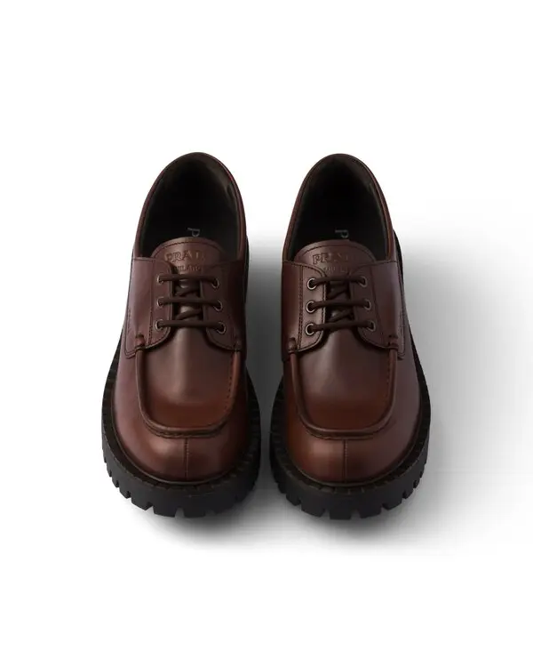 Prada Laced Leather Loafers