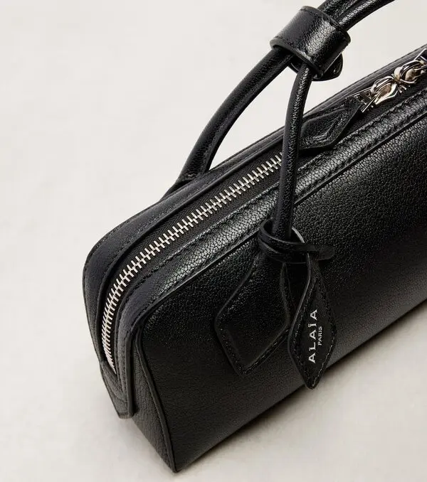 Alaïa Le Teckel Small Leather Clutch - Black