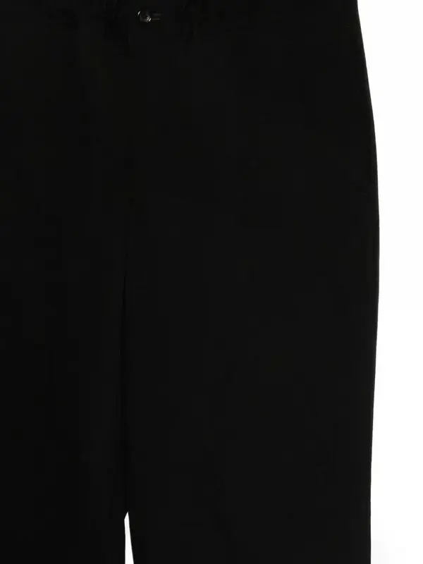 BLACK COMME DES GARÇONS Wool Trousers