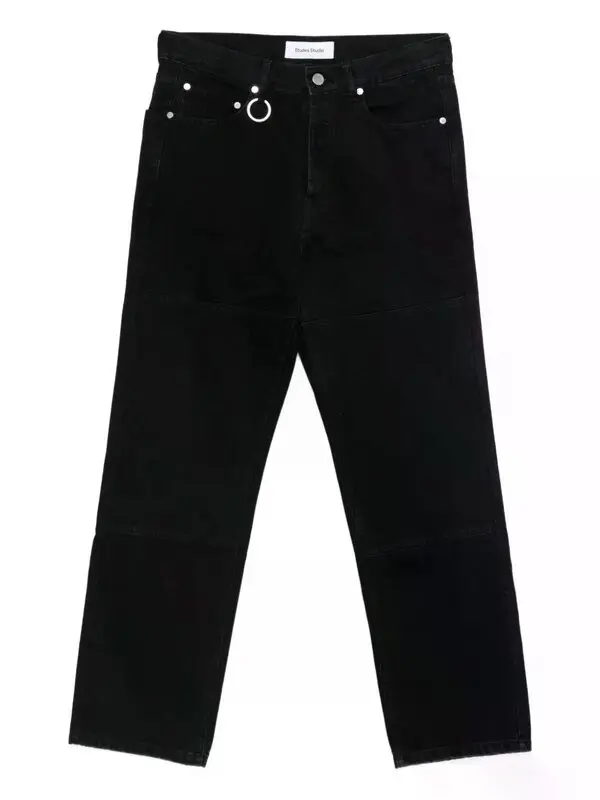 ÉTUDES STUDIO Ring-embellished Trousers