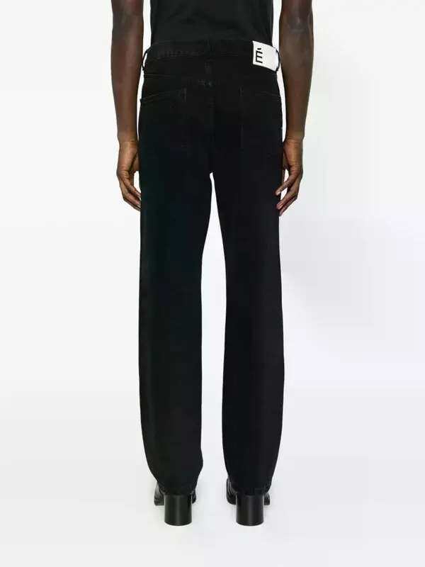 ÉTUDES STUDIO Ring-embellished Trousers