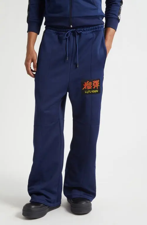 LU'U DAN Stacked Track Pants