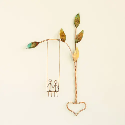 UNCOMMON GOODS Rooted In Love Swing Sculpture Haw Creek Forge - Loving Couple