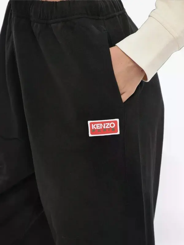 Khaite Button-detailed Pleated Trousers