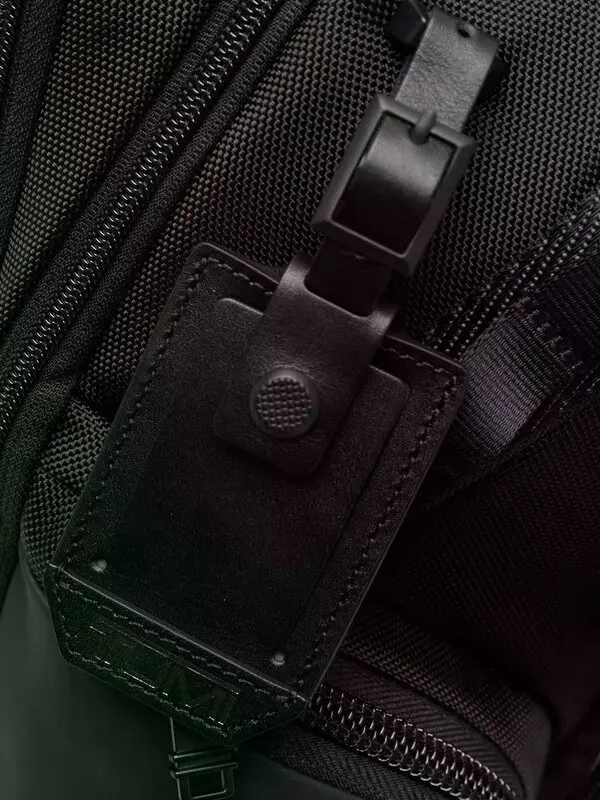 Tumi Canvas Backpack With Multiple Pockets