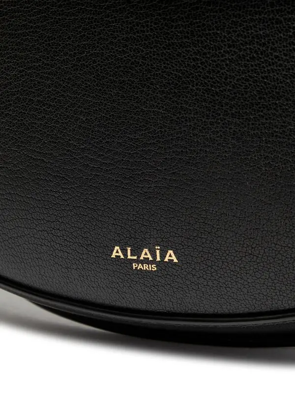 Alaïa Grained Leather Cross-body Bag - Black