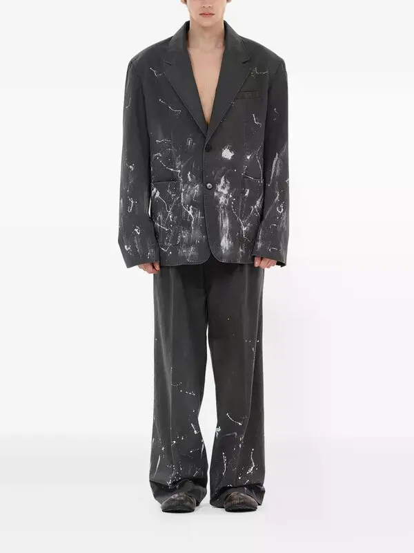 We11Done Pleated Paint-splatter Trousers