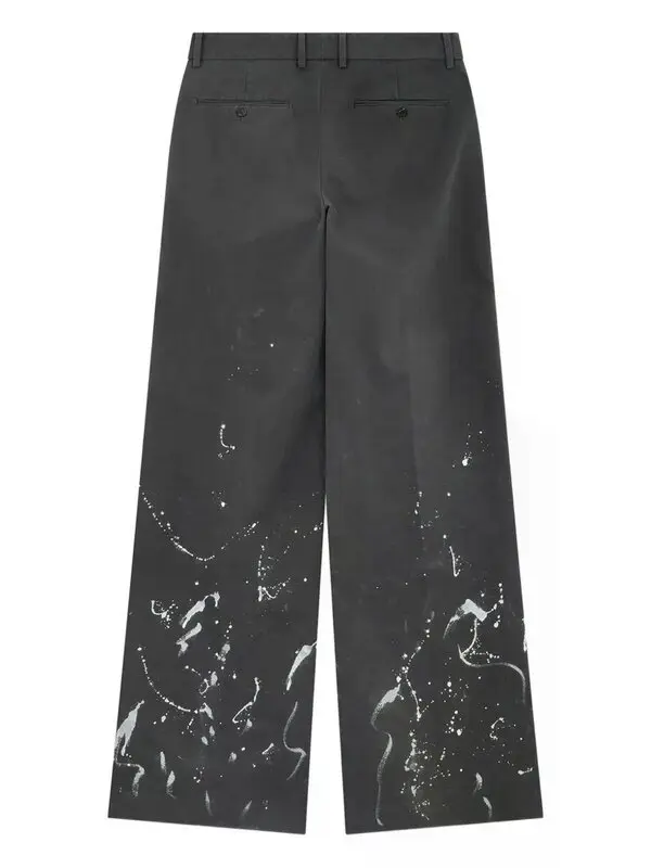 We11Done Pleated Paint-splatter Trousers