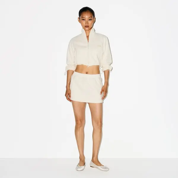 SKIMS Outdoor Fleece Mini Skirt - Ecru