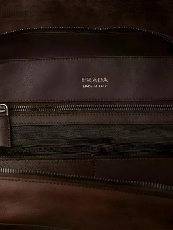 Prada Buckled Leather Backpack - Brown