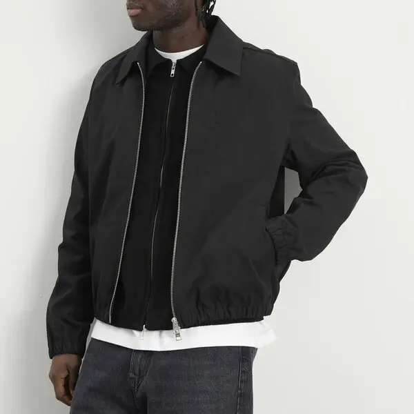 Ami Zipped Cotton Gabardine Jacket With Embossed De Coeur - Noir