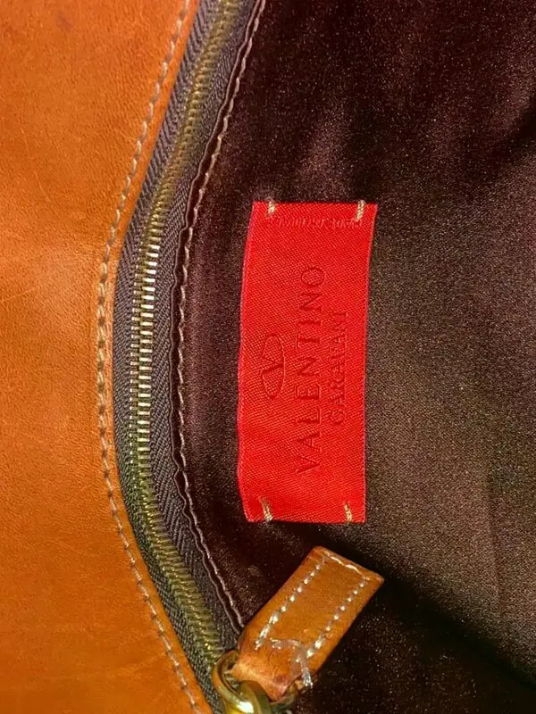 Valentino Garavani Flower Embossed Top Handle Bag