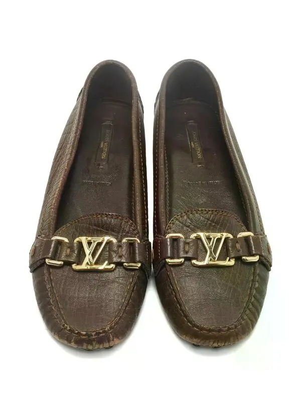 LOUIS VUITTON Logo-embellished Leather Loafers