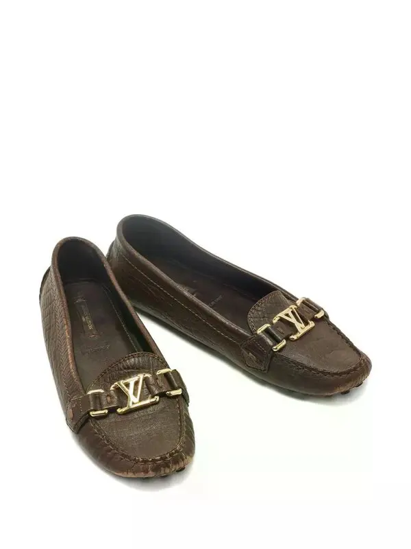 LOUIS VUITTON Logo-embellished Leather Loafers