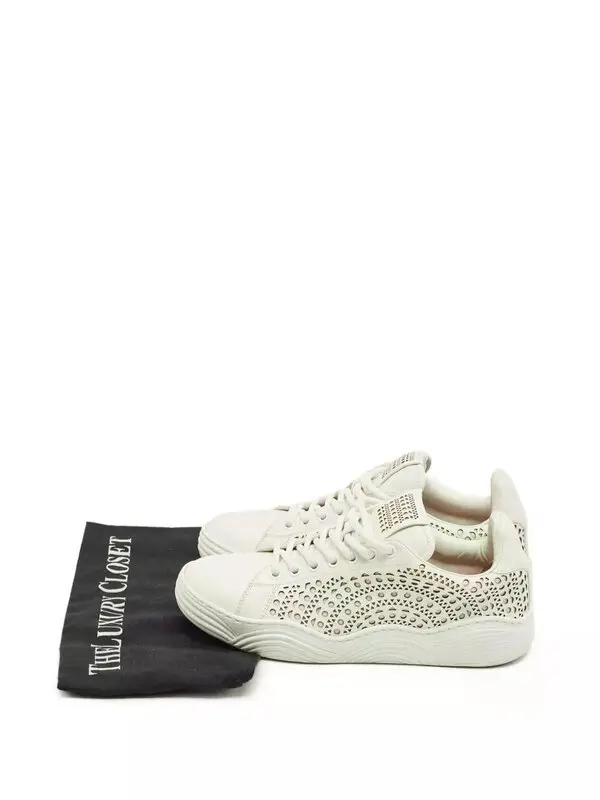 Alaïa Vienne Leather Cutout Sneakers