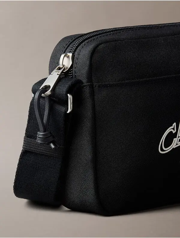 Calvin Klein Curved Logo Graphic Camera Bag