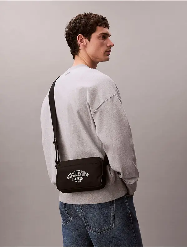 Calvin Klein Curved Logo Graphic Camera Bag