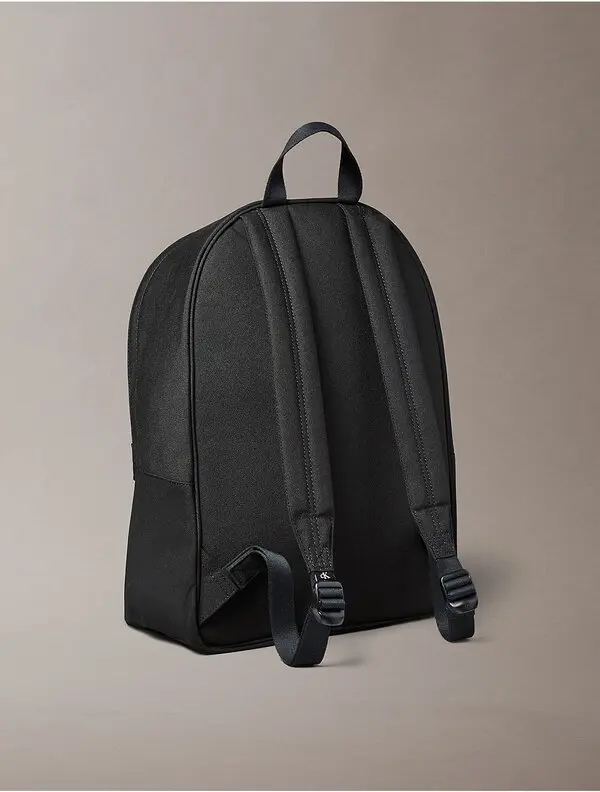 Calvin Klein Curved Logo Graphic Round Backpack