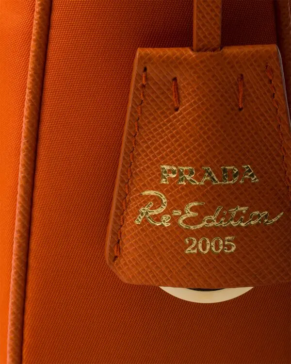 Prada Re-edition 2005 Re-nylon And Saffiano Mini Bag - Orange