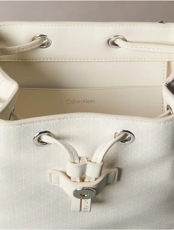 Calvin Klein Allover Emblem Logo Backpack - Lily White Aop