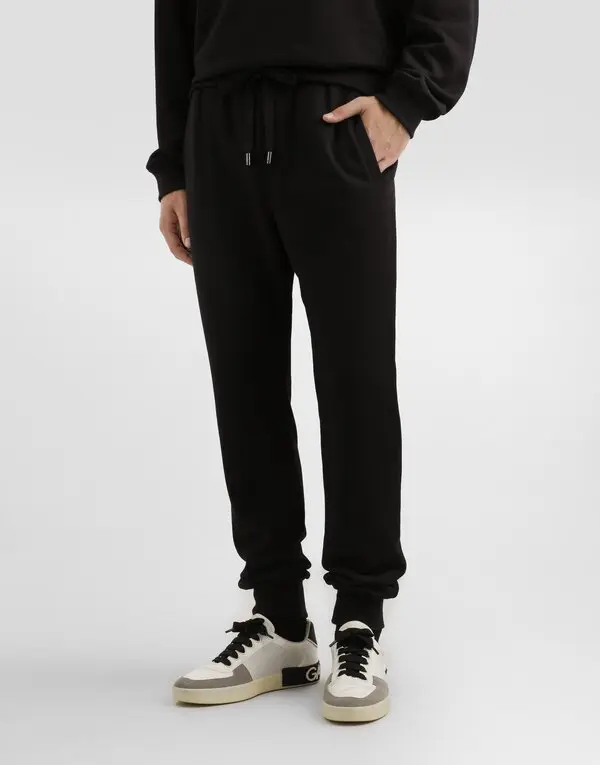 Dolce & Gabbana Jersey Trousers With Patch - Black