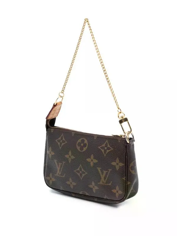 LOUIS VUITTON 2014 Monogram Mini Pochette Accessoires Handbag - Brown