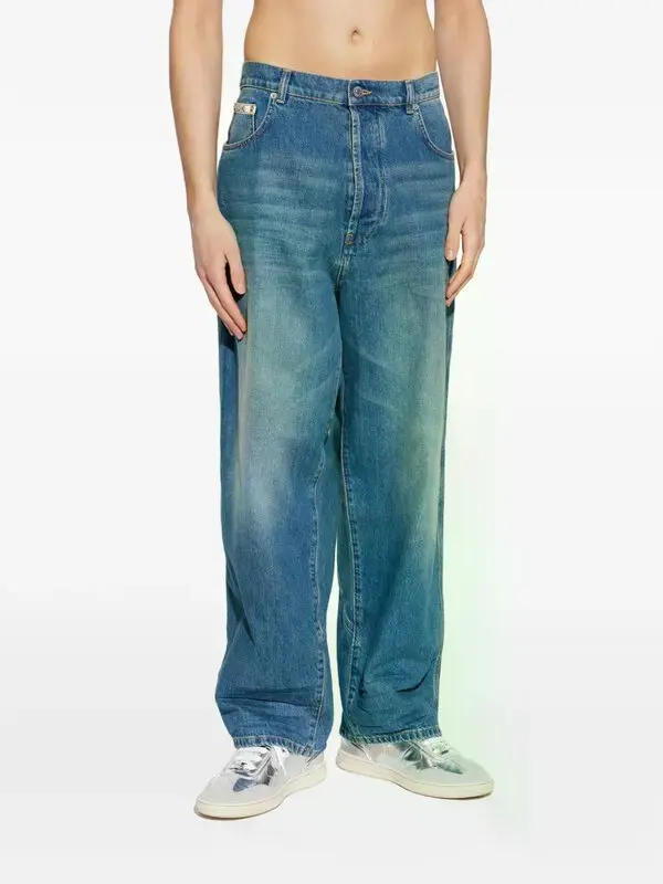 Moschino Wide-leg Jeans With Logo Detail
