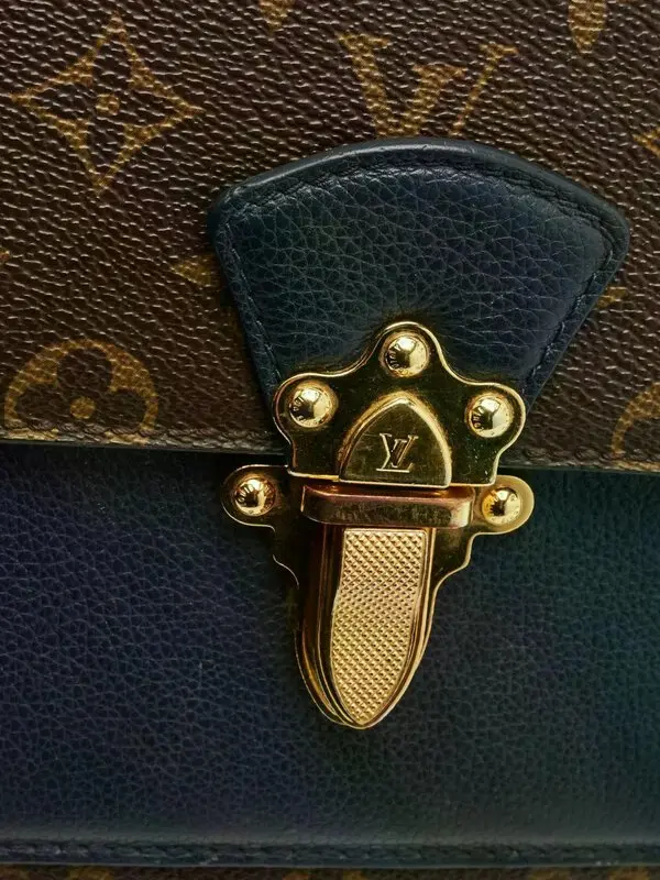 LOUIS VUITTON Victoire Monogram Shoulder Bag