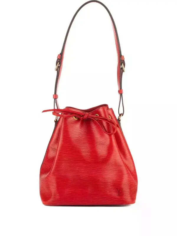 LOUIS VUITTON 1990s Monogram Embossed Leather Bucket Bag