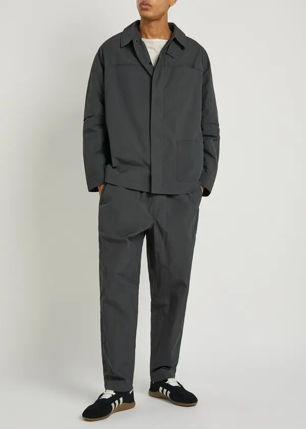 You Must Create Alva Skate Relaxed Tapered-leg Shell Trousers - Charcoal