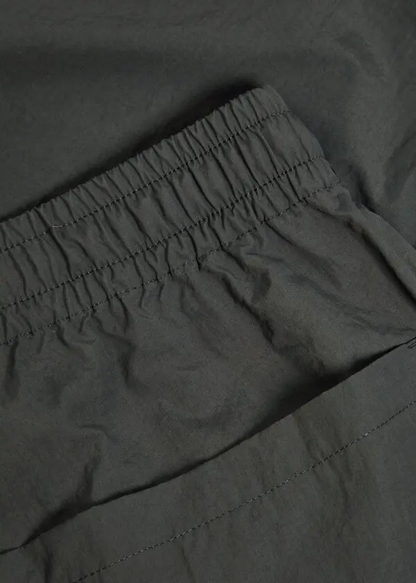 You Must Create Alva Skate Relaxed Tapered-leg Shell Trousers - Charcoal